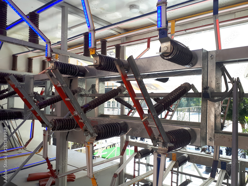 High voltage circuit breaker in a power substation Stock Photo | Adobe ...