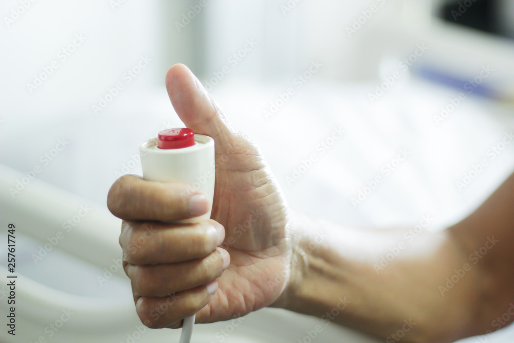 hand of patient pushing emergency button in the hospital. Stock Photo ...
