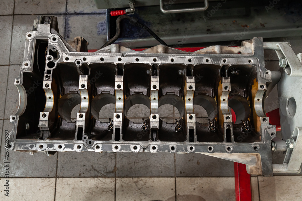 Replacement engine used on a crane mounted for installation on a car ...