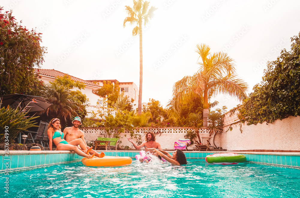 Photo & Art Print Group of happy friends relaxing in swimming pool ...