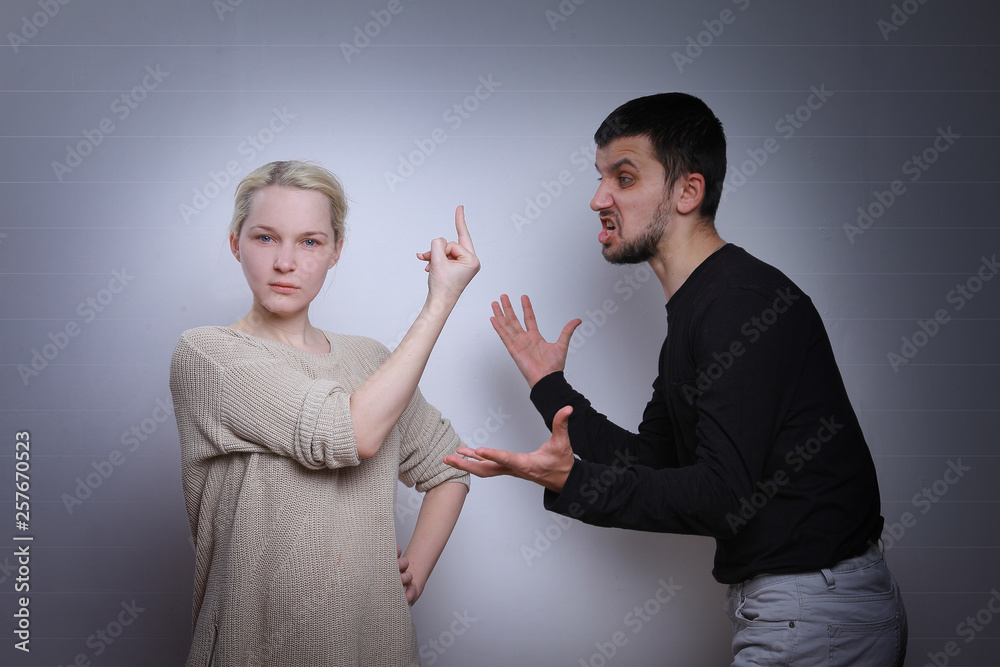 Man brandishing his wife. Husband and wife arguing, man and woman ...