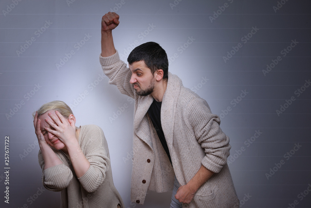 Man brandishing his wife. Husband and wife arguing, man and woman ...