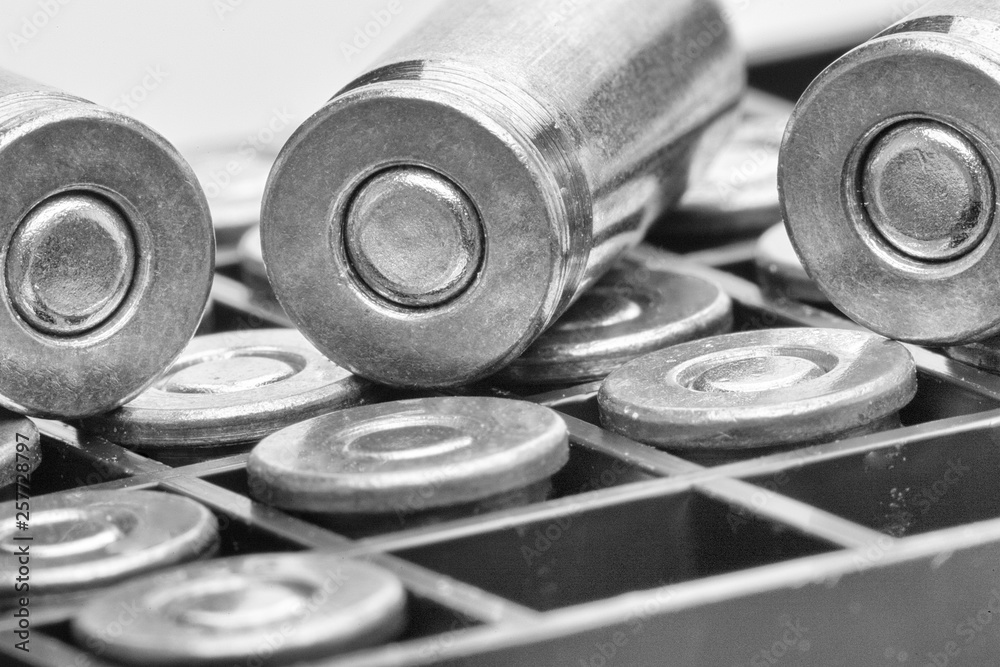 Pile of pistol bullets. The concept of limiting the spread of small ...
