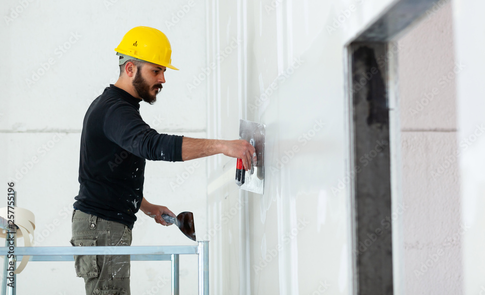Poster worker plastering gypsum board wall. – Wall Art | UkPosters