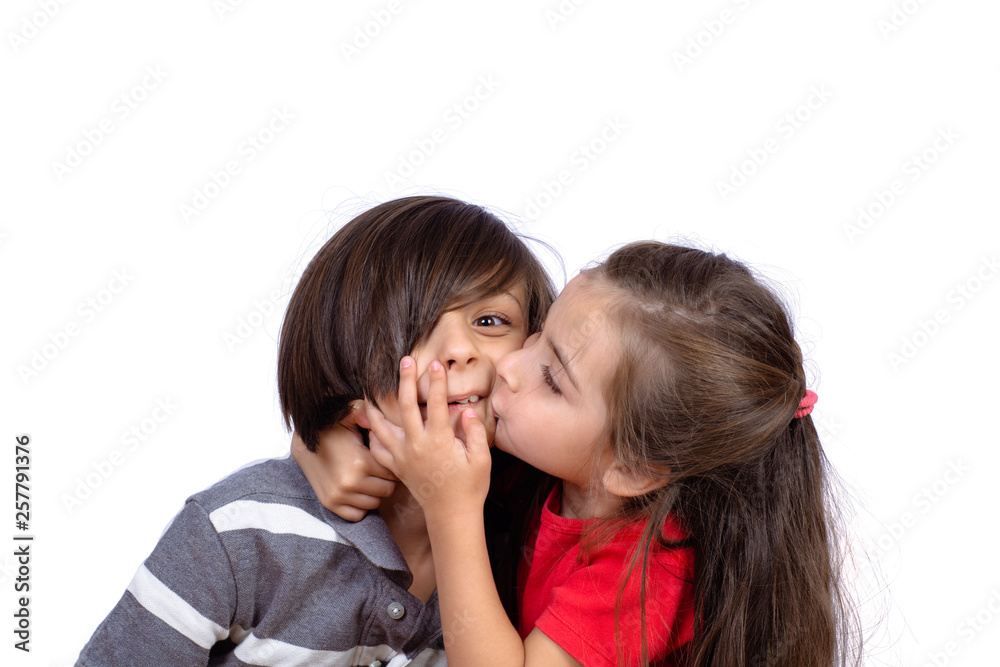 Little girl kissing little boy face. Stock Photo | Adobe Stock