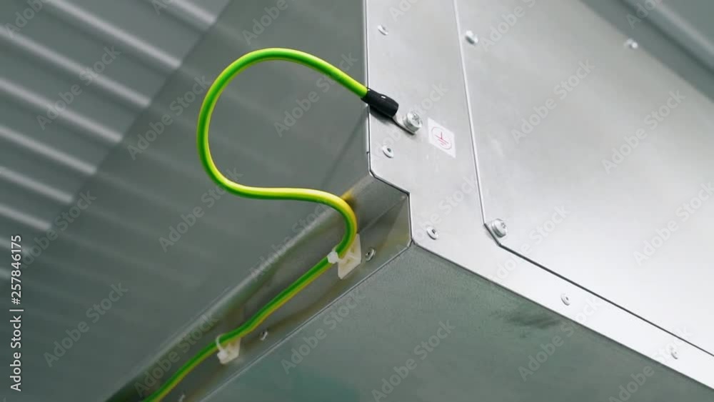 The electrical ground cable is connected to the housing of the modular ...