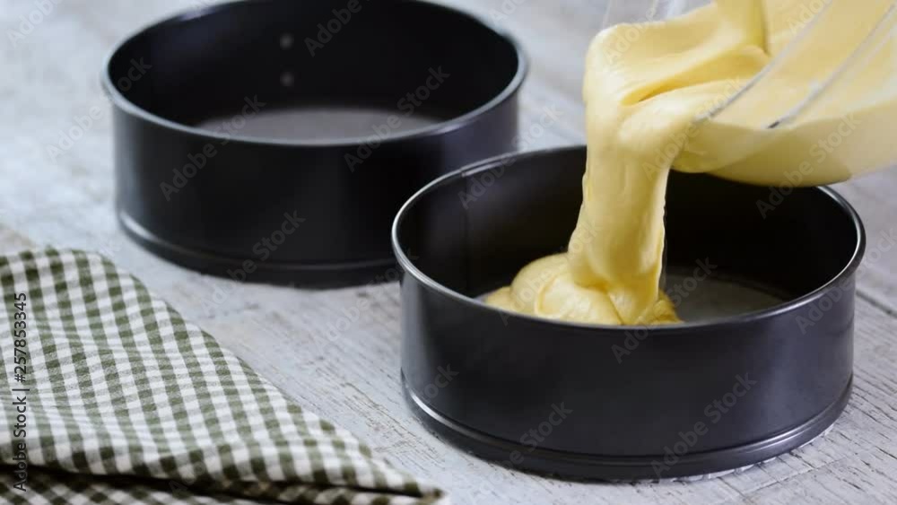 Pouring cake mixture into tin. Making pastry dough. Making torte with ...