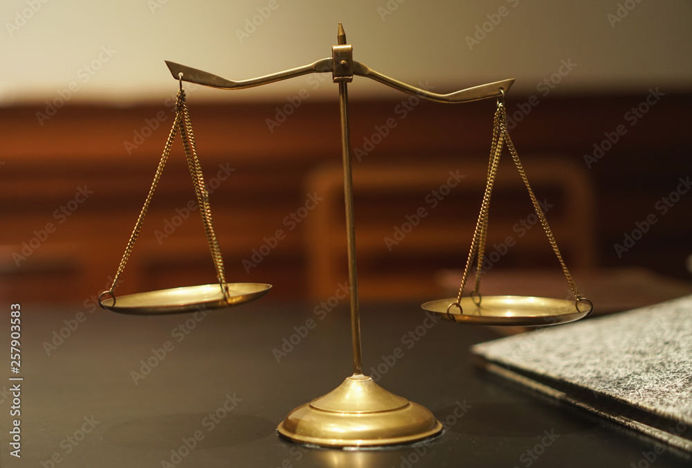 Gold brass balance scale,weight balance, imbalance scale on wooden ...