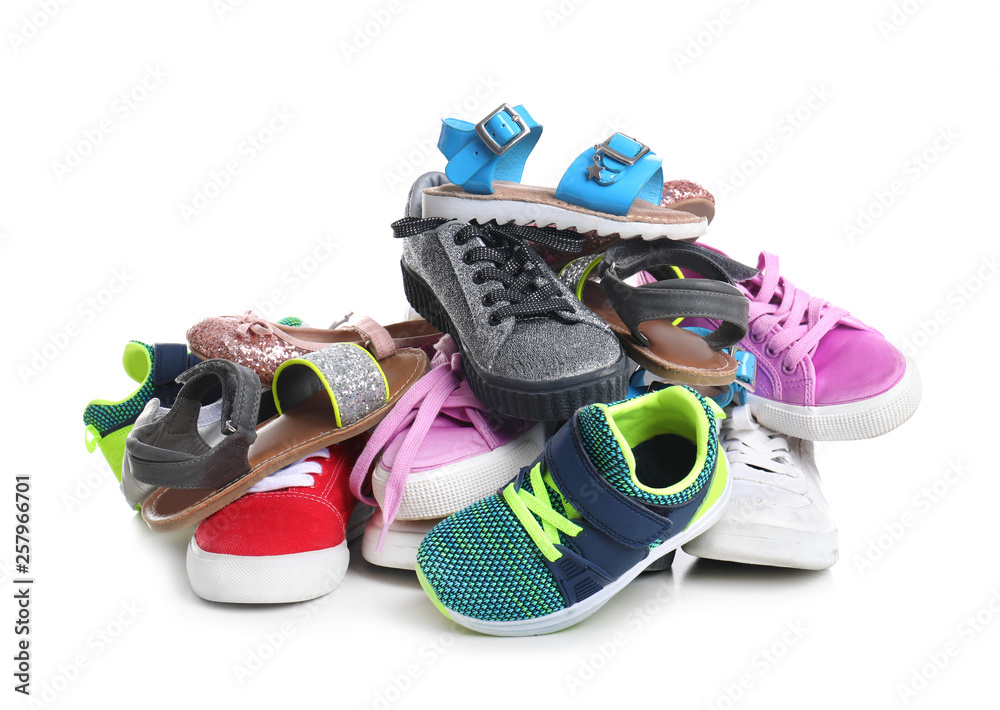 Pile of different shoes on white background Stock Photo | Adobe Stock