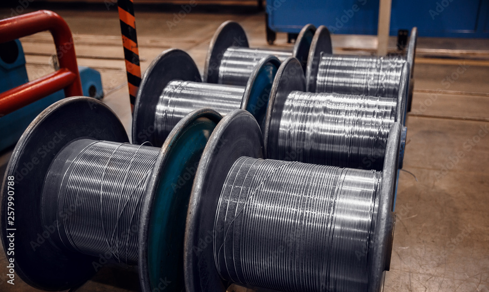 Steel wire, aluminum on reels in the industrial production for ...