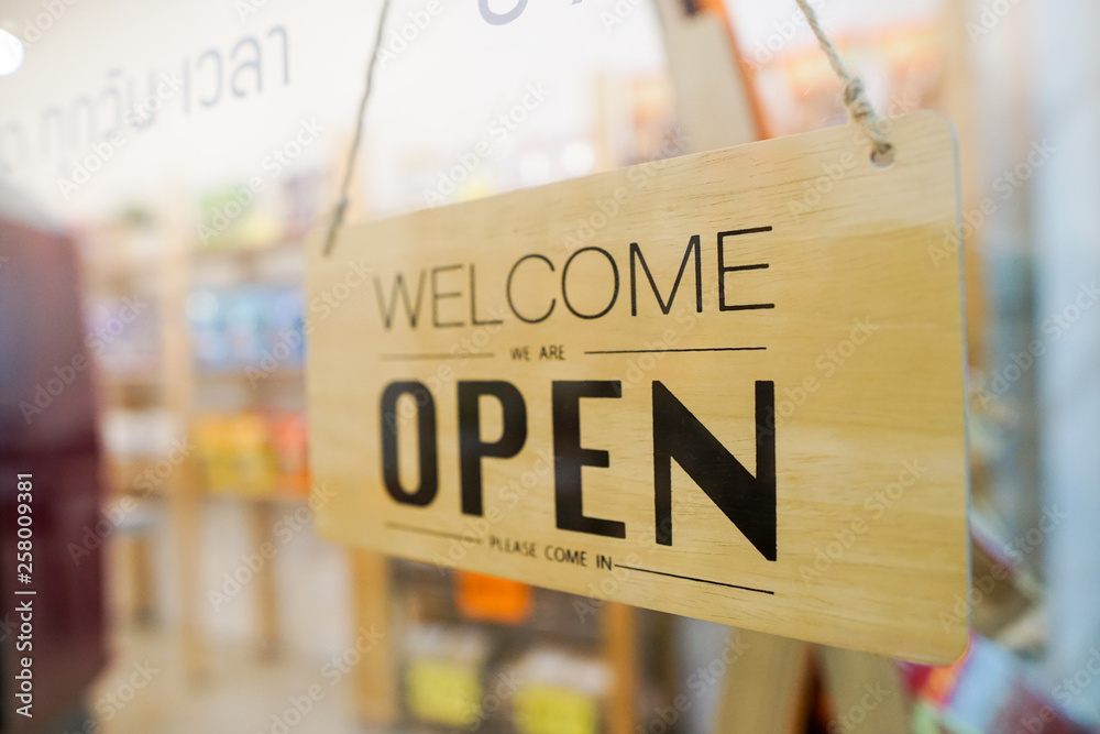 Wooden sign board hanging on door of shop cafe, we are open. Stock ...