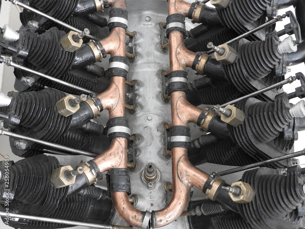 Parts of the old aircraft engine. Nuts connecting tubes, nozzles ...