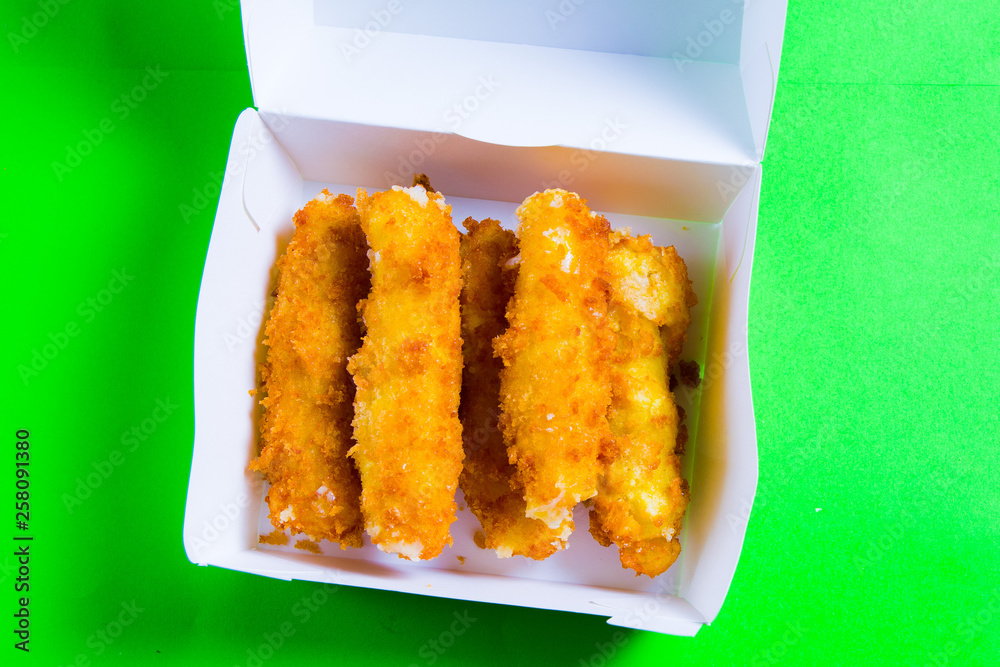 crusty cheese sticks fried in hot box lie in a box Stock Photo | Adobe ...