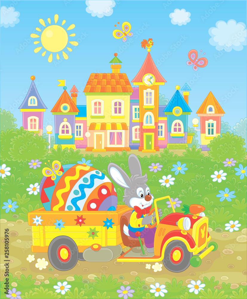 Grey rabbit driving a small toy truck with a big colored Easter egg ...