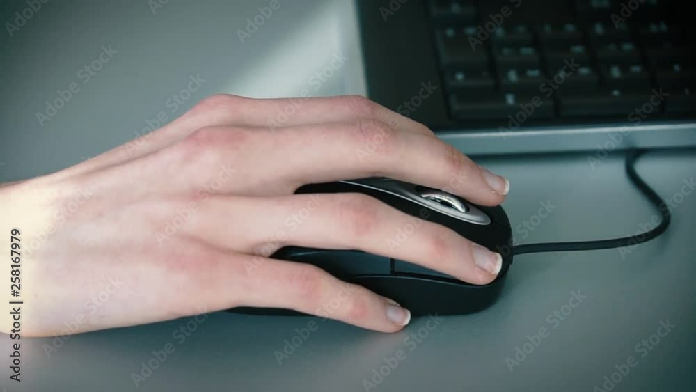 Vidéo Stock Office concept: mouse closeup, man hands tapping on black ...