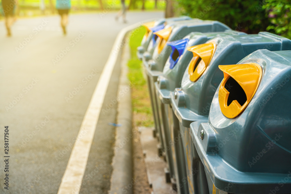 Colorful plastic trash bin many type of garbage in green park Stock ...
