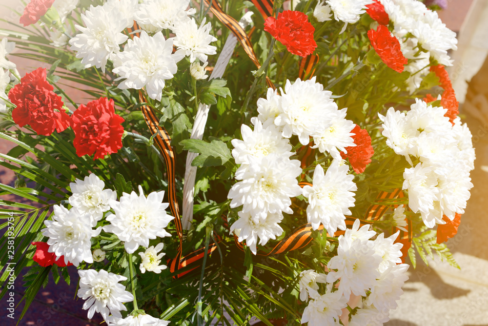 St. George ribbon, a composition of red carnation and white ...