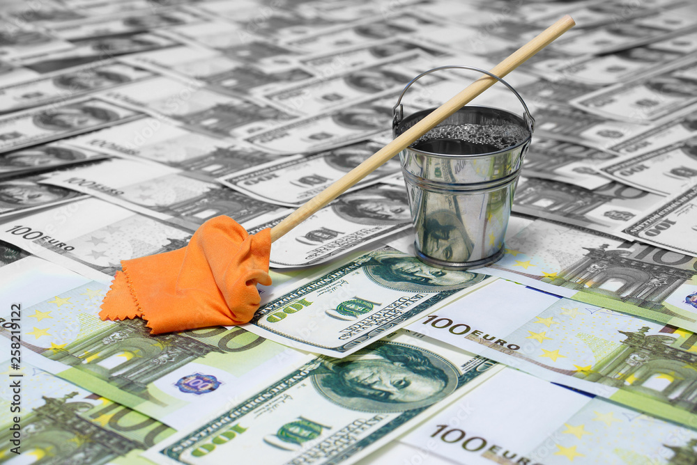 Foto de Laundering of money. The concept of corruption. A bucket of ...