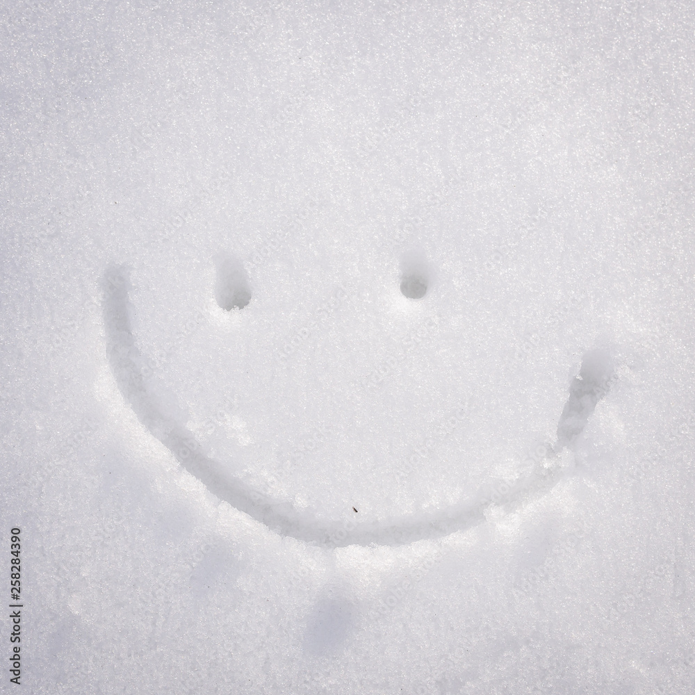 Happy face smiley drawn on white snow, frosty winter day. Stock Photo ...