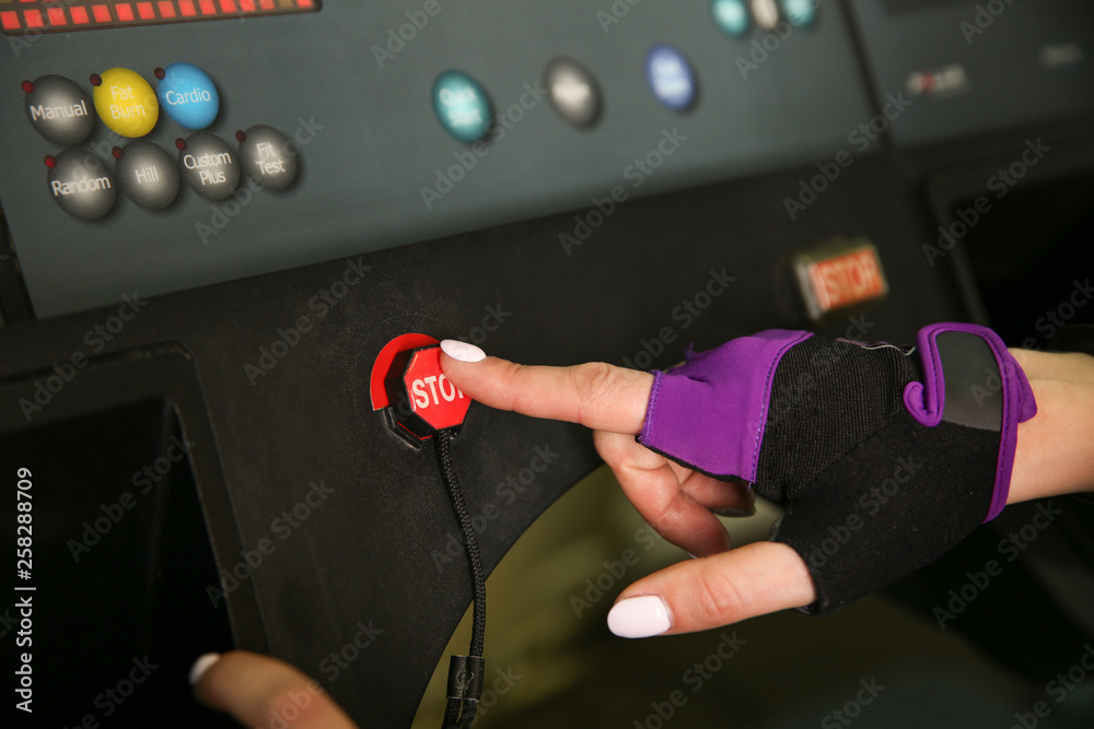 stop button on the treadmill. the control panel of the treadmill in the ...