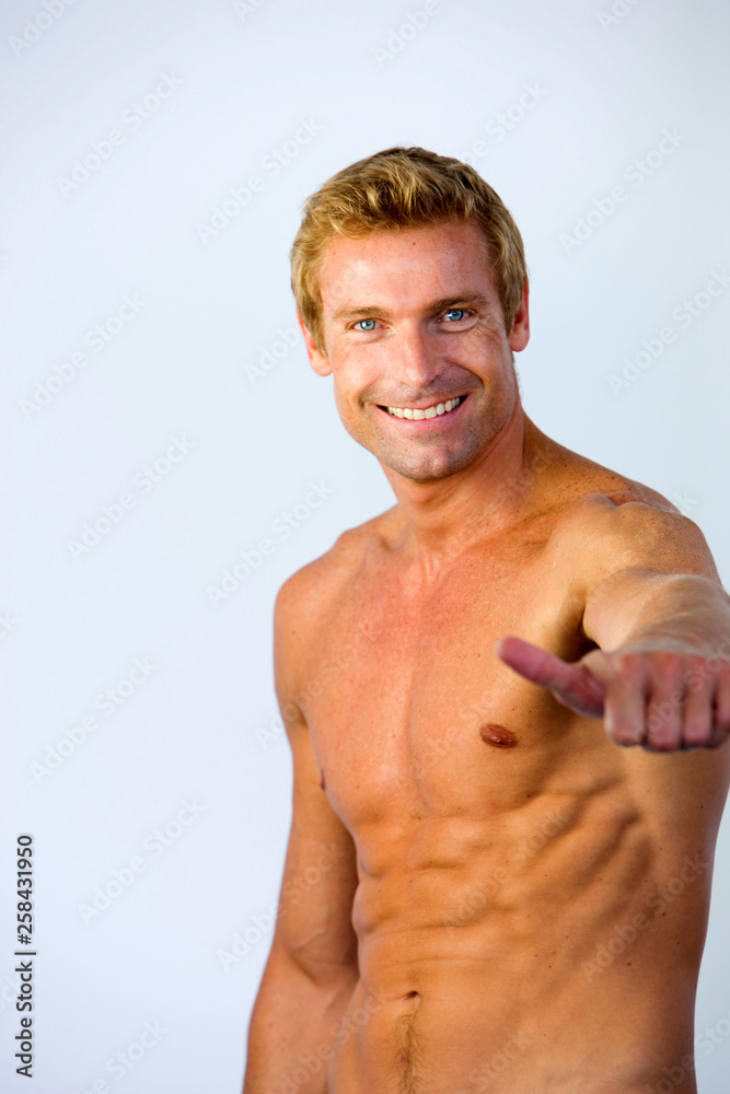 Bare-chested man thumbs up Stock Photo | Adobe Stock