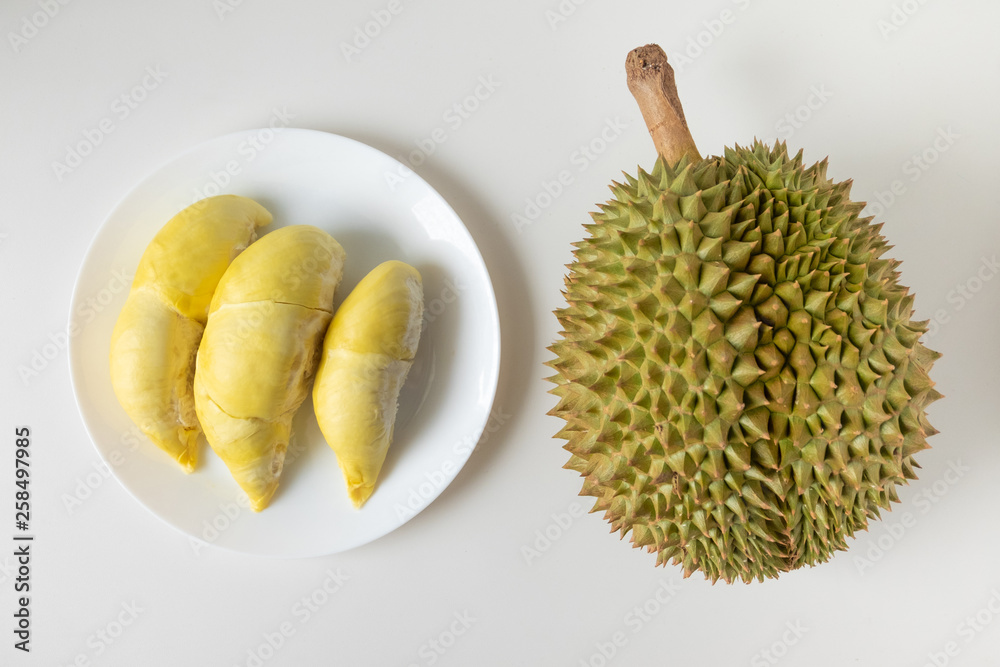 Top view of fresh cut Durian and pulp of Durian yellow color on dish ...