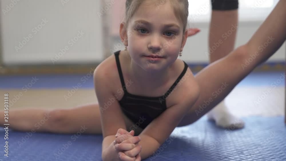A demonstration video of a professional gymnast performing the heel ...