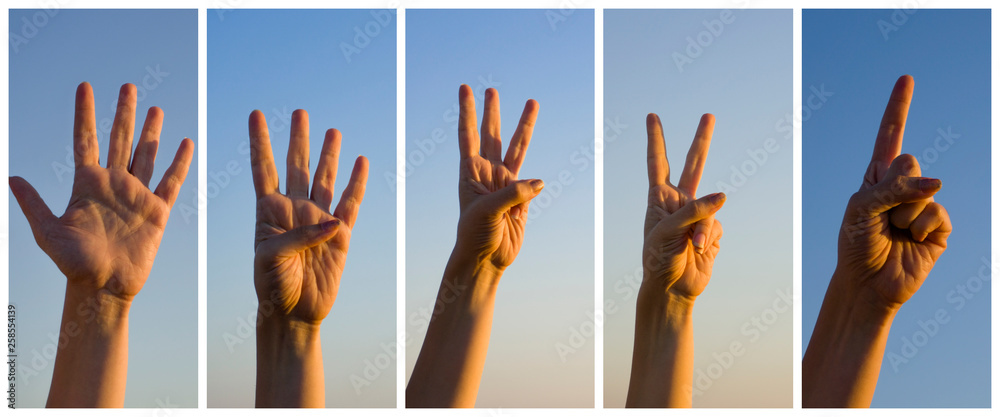Hand countdown concept. Hand counting down on blue background ...