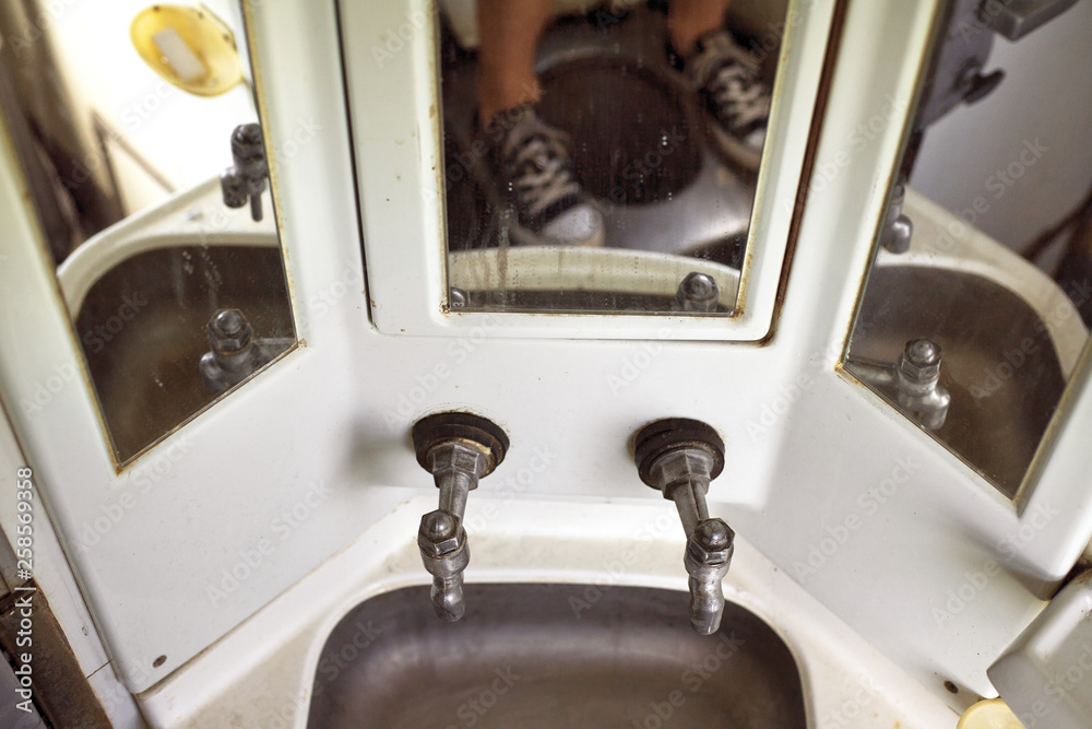 toilet in the train, reflection in the mirror of the train toilet Stock ...