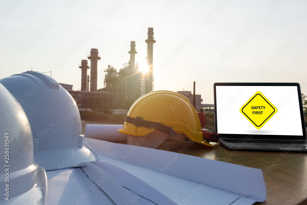 Helmet on table in a power plant industry. Energy power station area ...