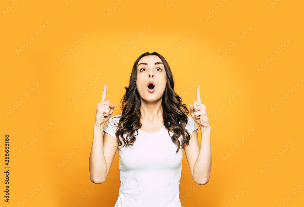 Got the idea! Dazed girl next to the bright colored background with ...