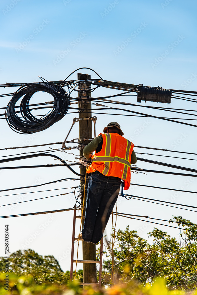 Lineman On Pole