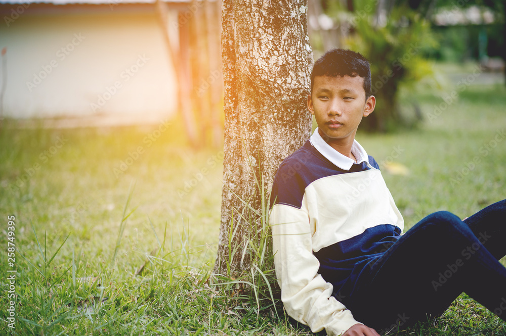 Boy Waiting For Someone