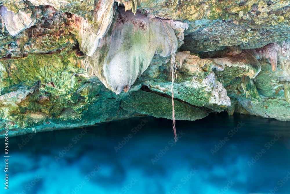 Underground Rock Formations and Fresh Blue Water in Cenote Dos Ojos ...