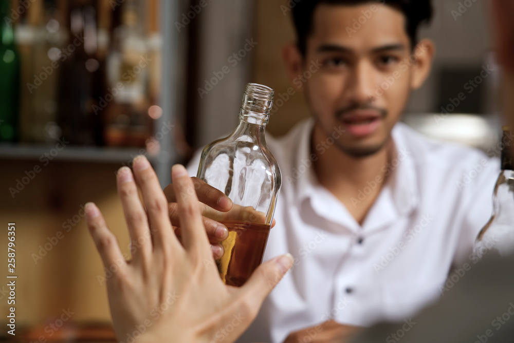 No more alcohol concept. Close up shot of hand refusal alcohol from the ...