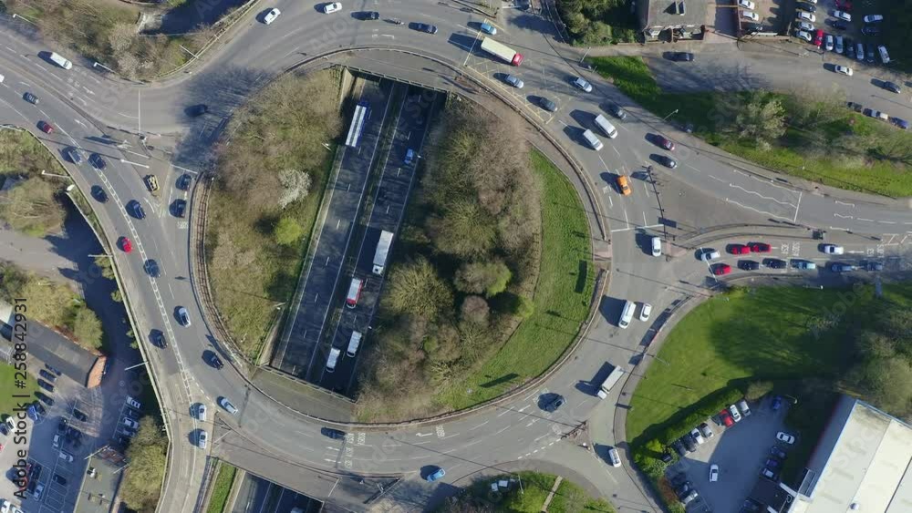 Aerial footage of a large section of commuter motorway, highway, during ...