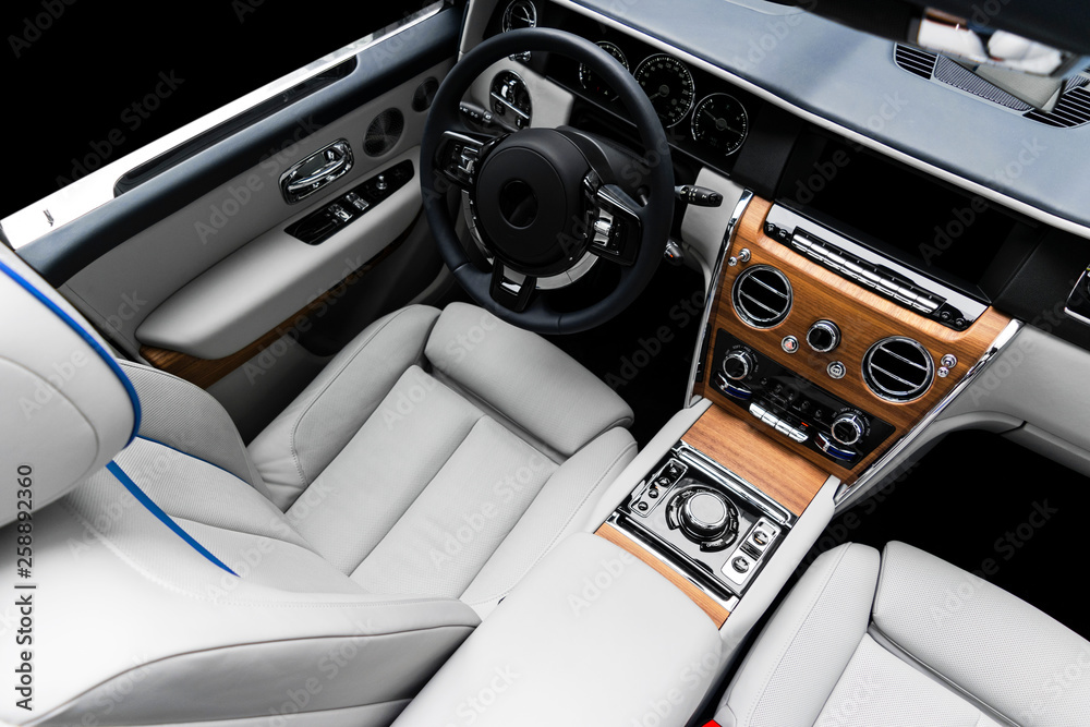 Modern luxury car white leather interior with natural wood panel. Part ...