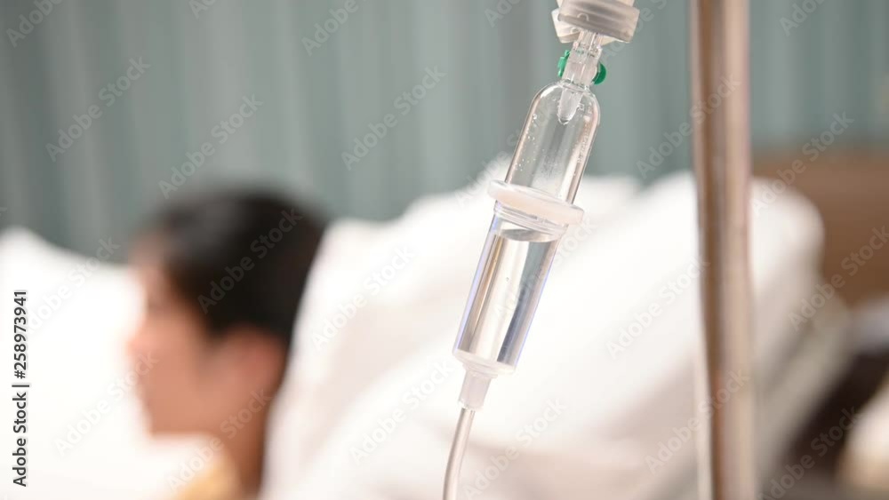 4K Infusion bottle with saline solution for patient in hospital room ...