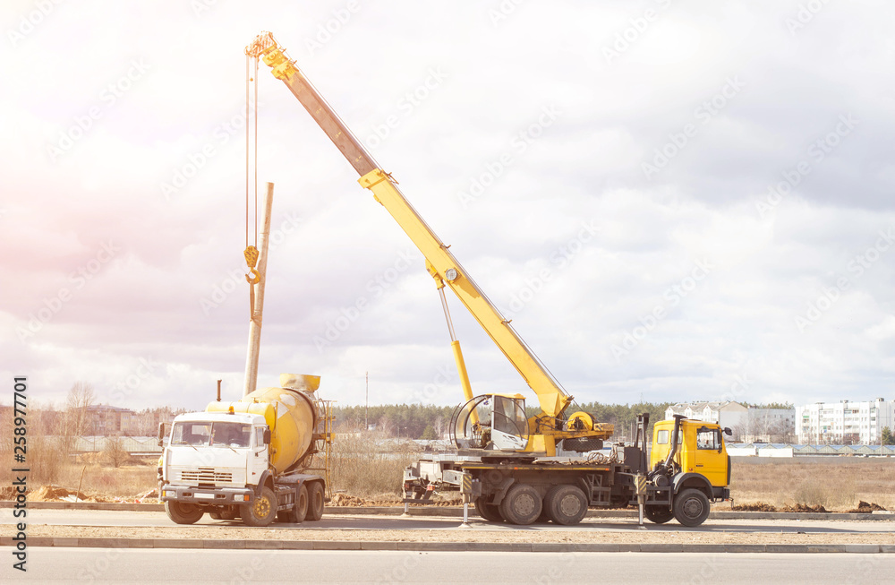 Installation and construction of lighting lamps on the new road using a ...