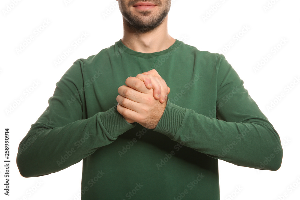 Man showing BELIEVE gesture in sign language on white background ...