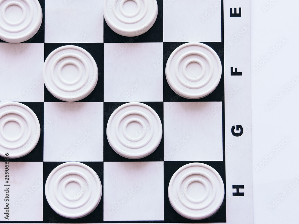Checkerboard with checkers. Business strategy competition, strategic ...