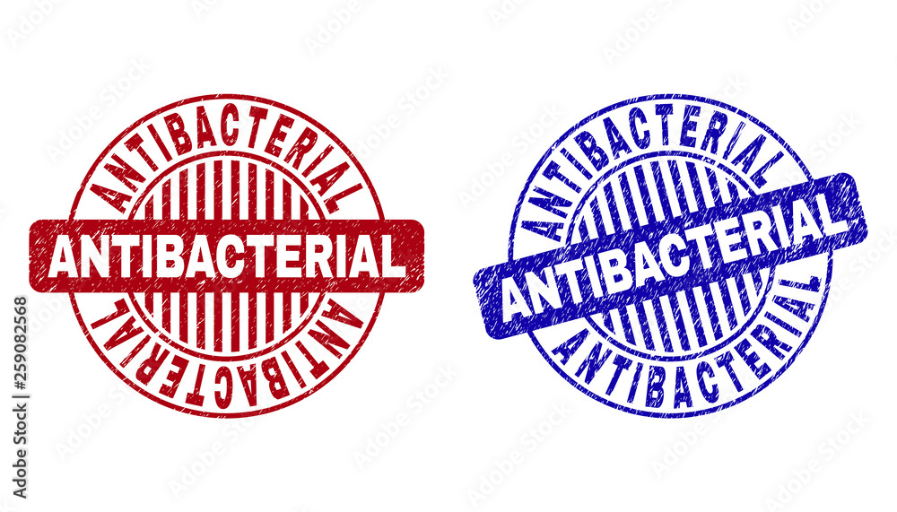 Grunge ANTIBACTERIAL round stamp seals isolated on a white background ...