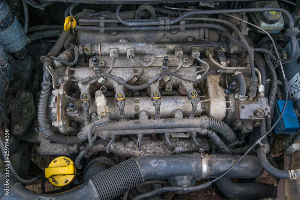 Old used diesel engine with rusty and dirty auto parts, water ...