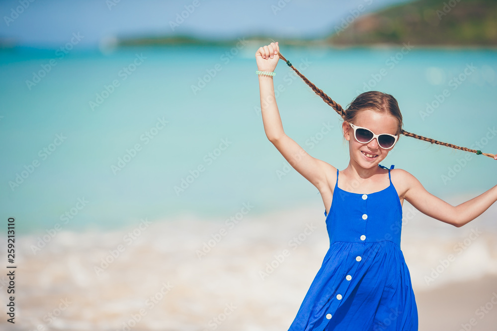 Portrait of beautiful girl on the beach dancing Stock Photo | Adobe Stock