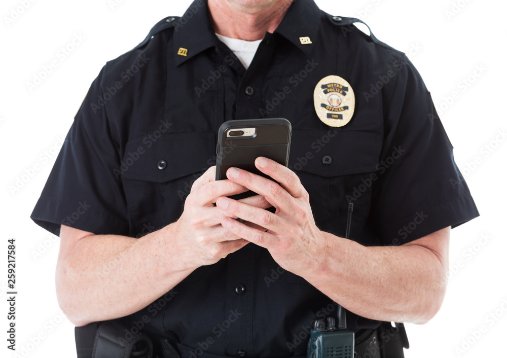 Police: Anonymous Officer Using Cell Phone Stock Photo | Adobe Stock