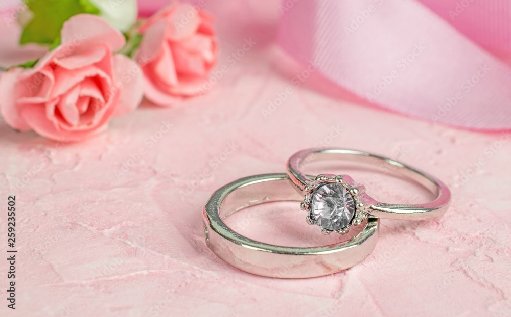 Wedding Rings Pink Background