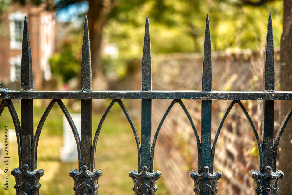 An old wrought iron fence around a cemetery in Georgetown, SC. Stock ...
