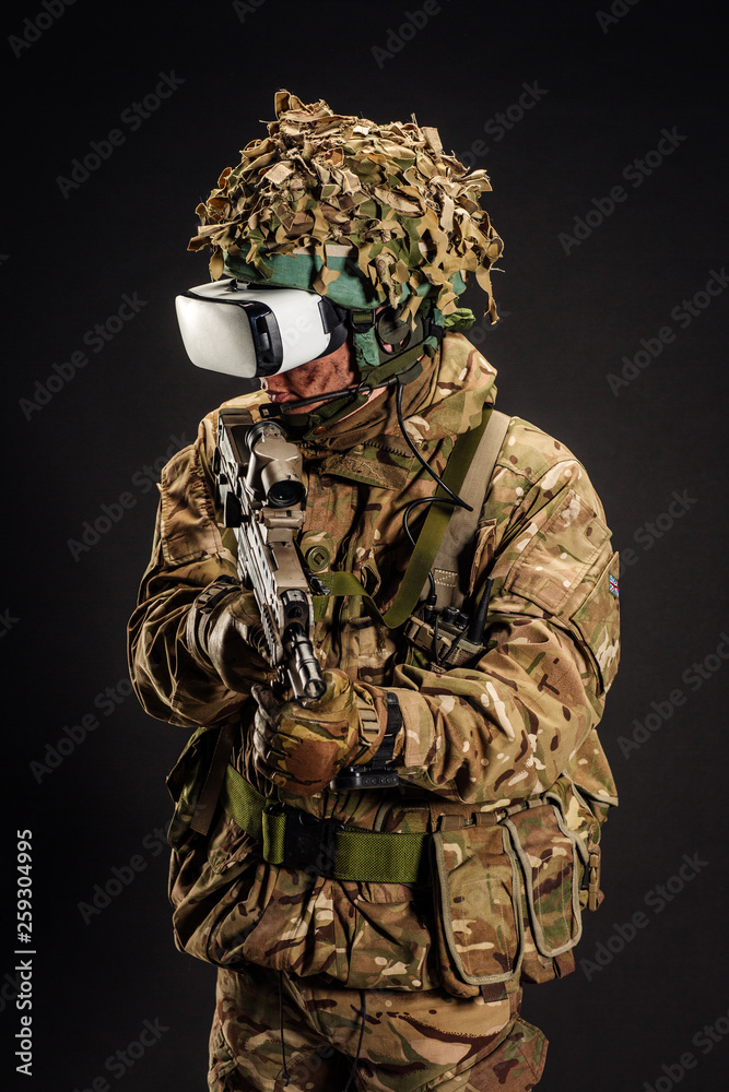 soldier use a VR glasses for combat simulation training. war, army ...