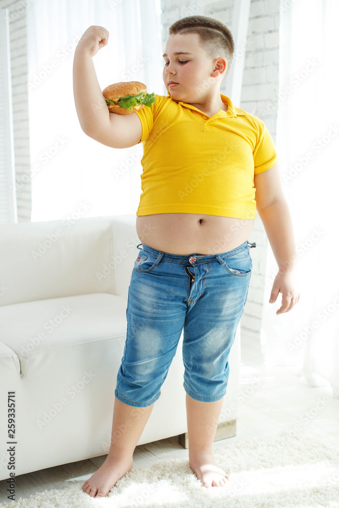 A child with overweight Stock Photo | Adobe Stock