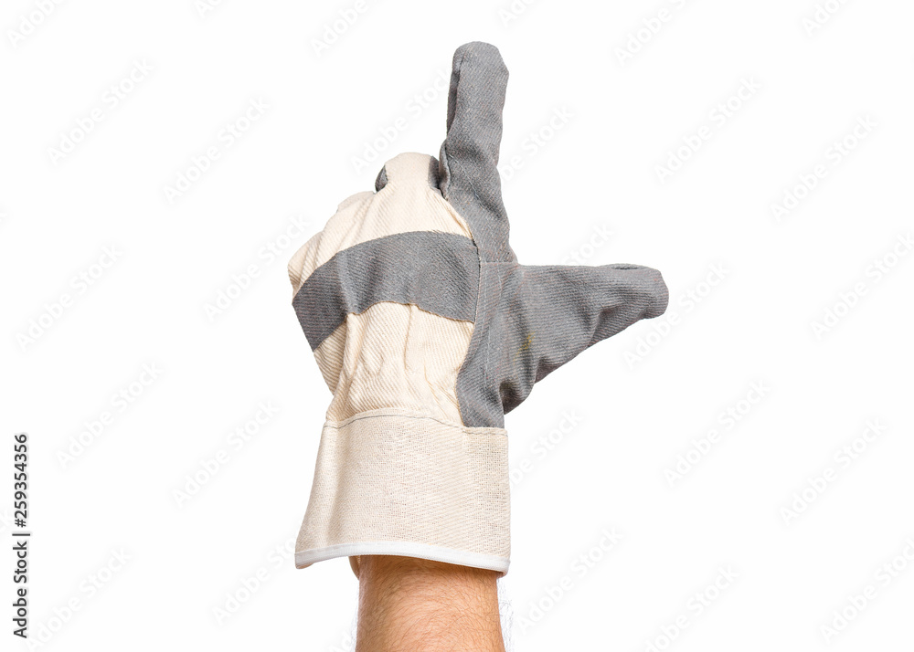 Worker showing gesture - two fingers, gun sign. Male hand wearing ...